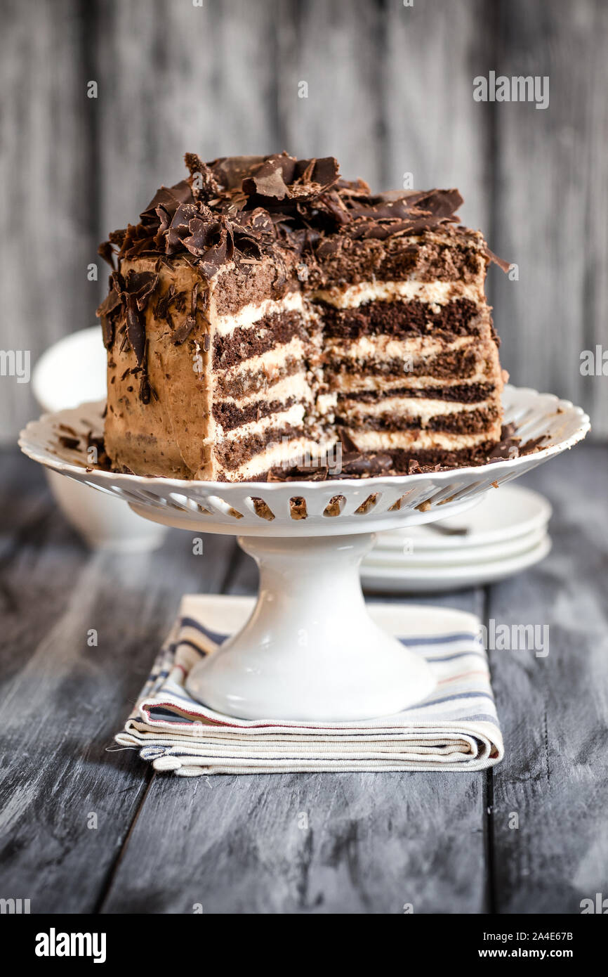 Creating a delicious multi-layered cake at home Stock Photo - Alamy