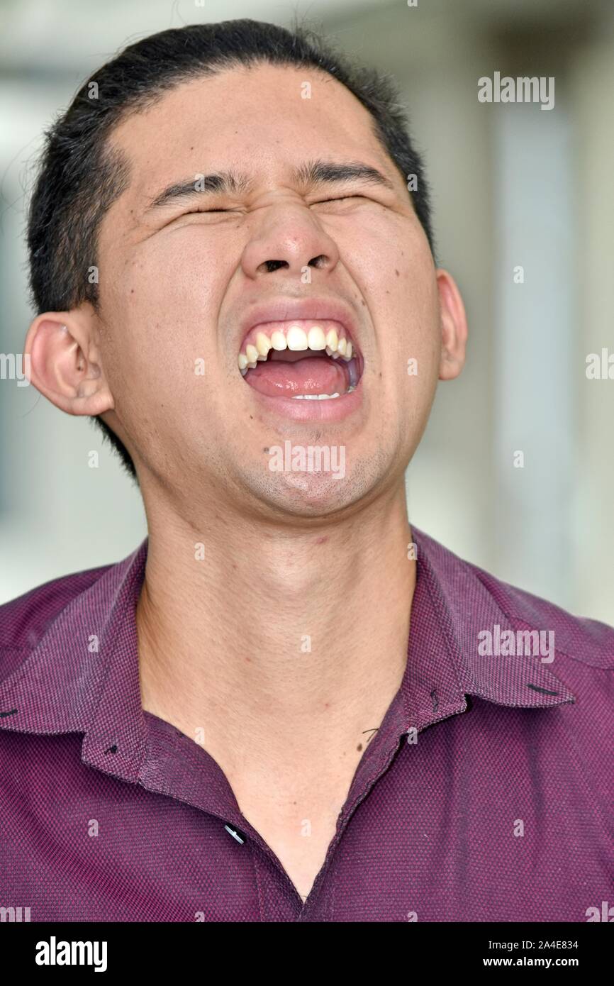 Handsome Filipino Male Laughing Stock Photo - Alamy