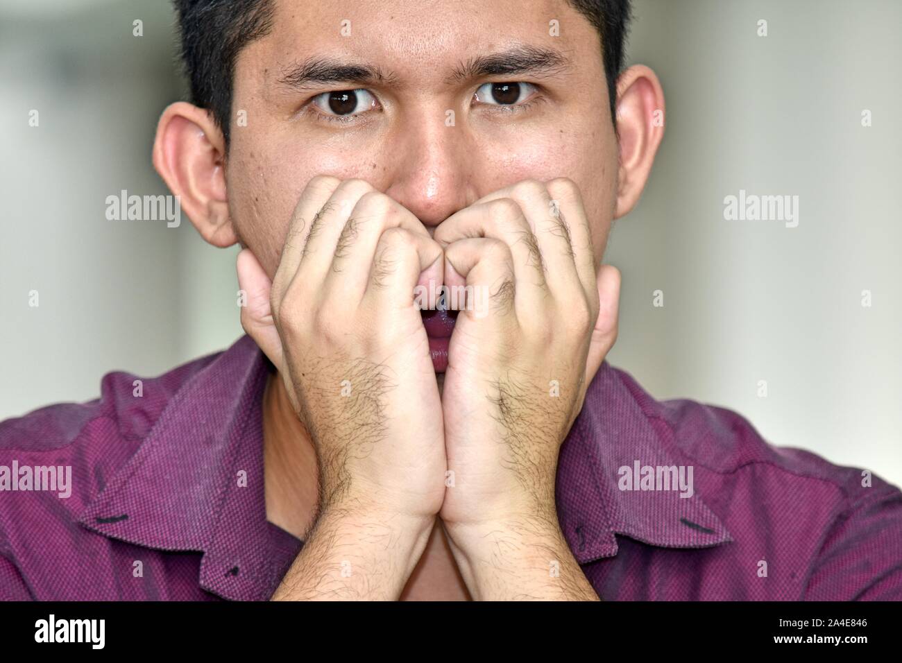 Young Filipino Adult Male And Fear Stock Photo - Alamy