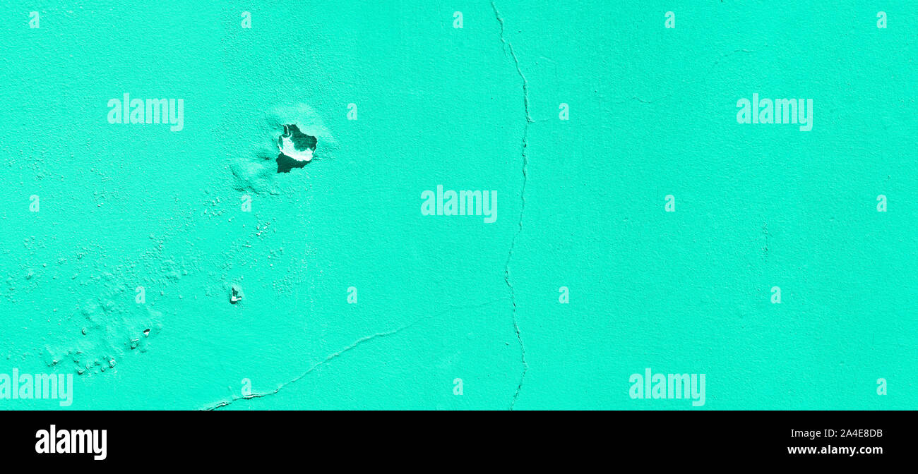 Old cracked mint wall. Painted texture background in trendy turquoise ...