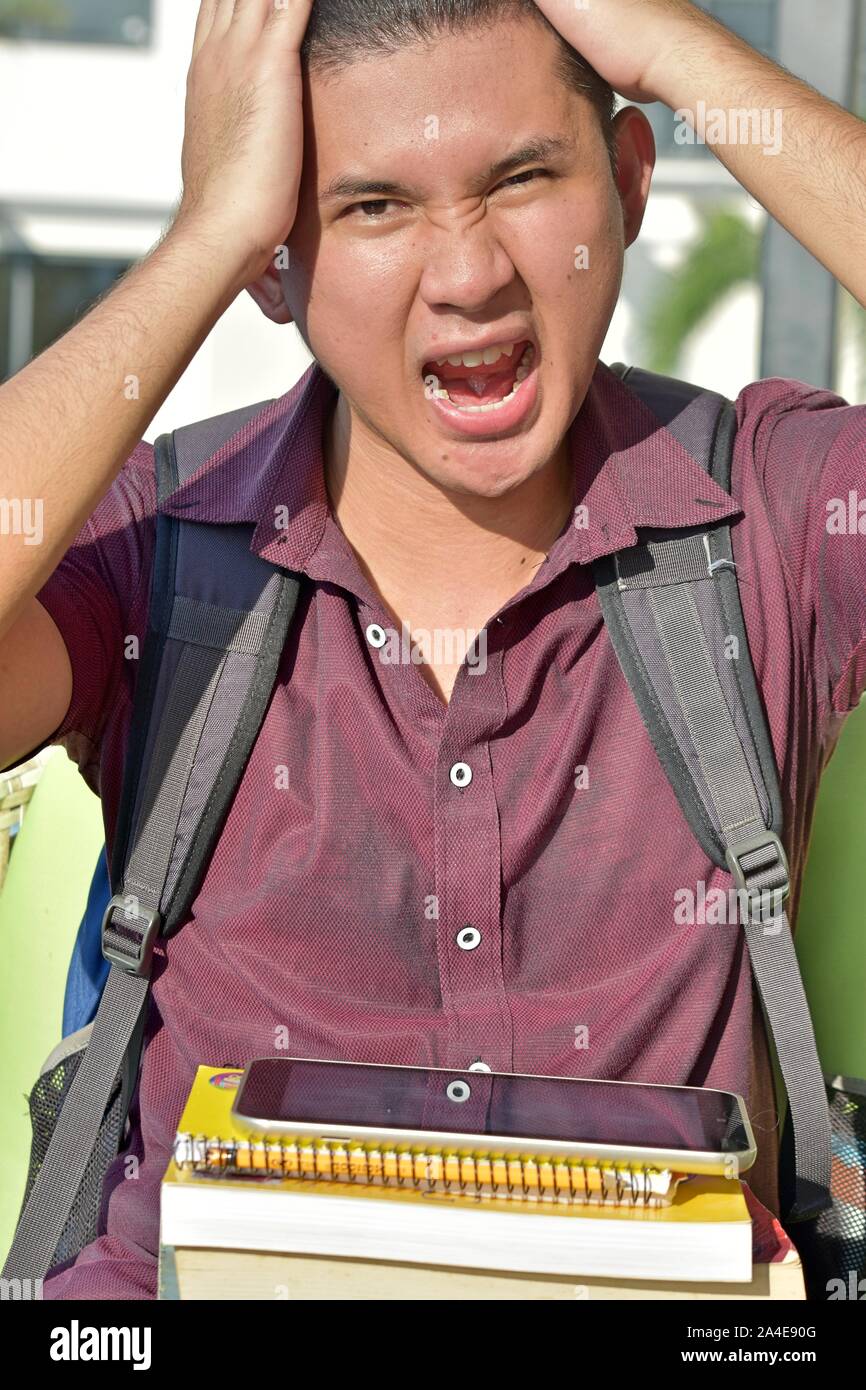 University Asian Boy Student Under Stress Stock Photo - Alamy
