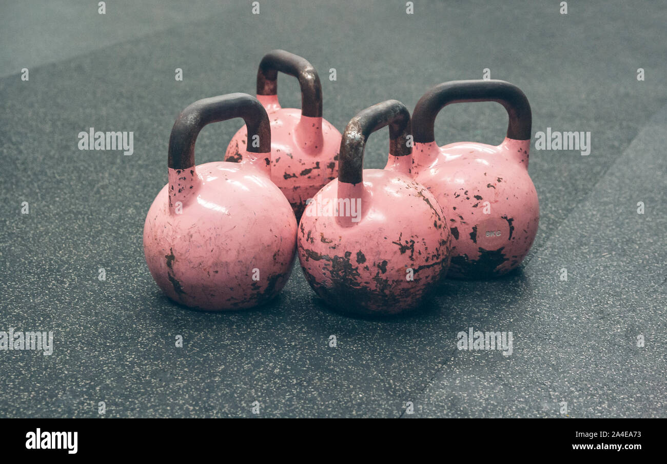 Kettlebells on the floor of a gym Stock Photo - Alamy
