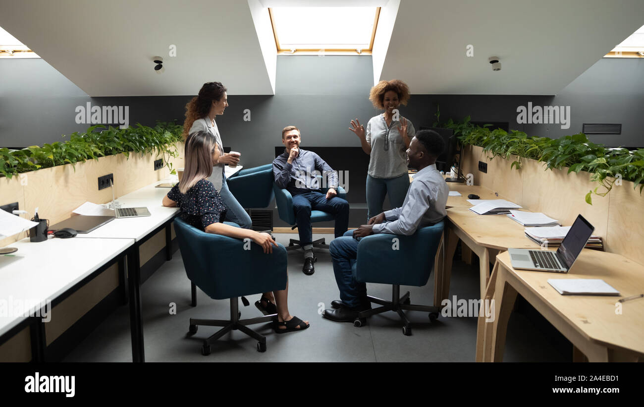 African team leader telling about new project to diverse staff Stock ...