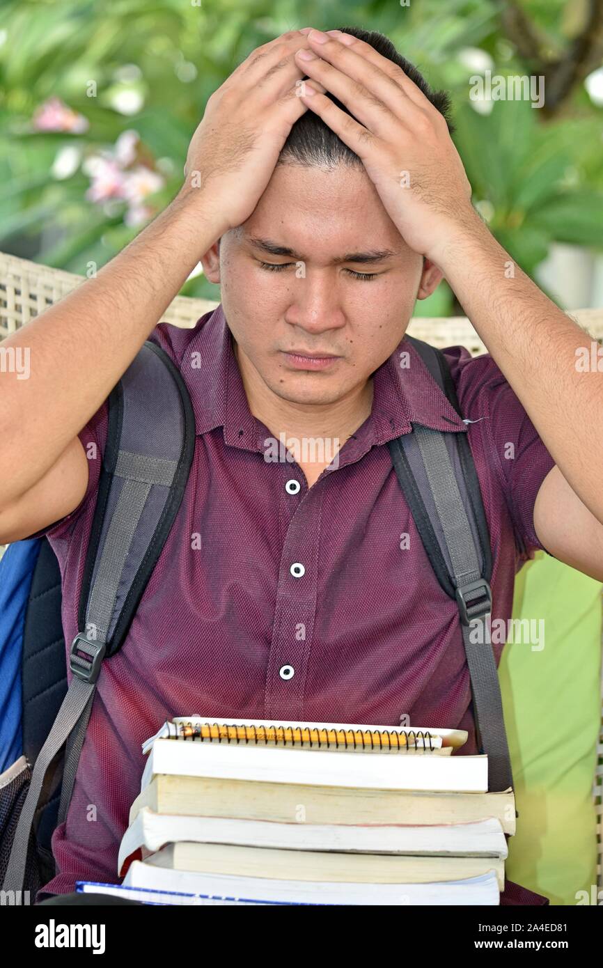 Filipino Boy Student With Headache Stock Photo - Alamy