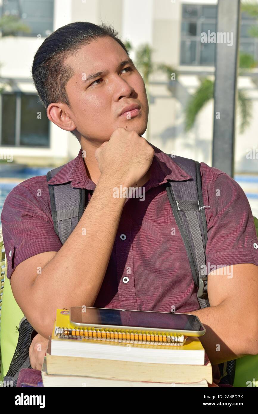 Thinking Young Boy Student Stock Photo - Alamy