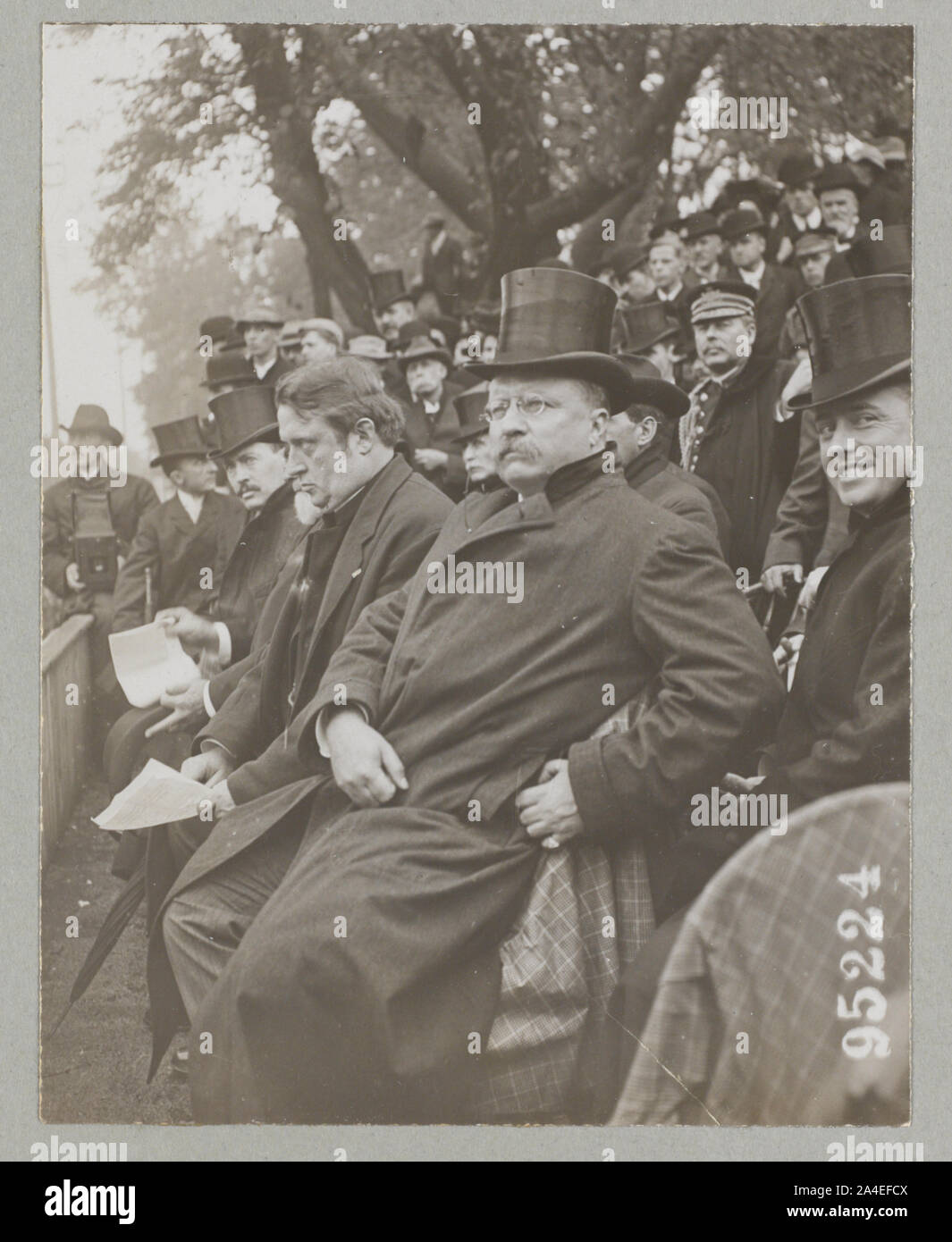 Theodore Roosevelt seated viewing parade outside Stock Photo - Alamy