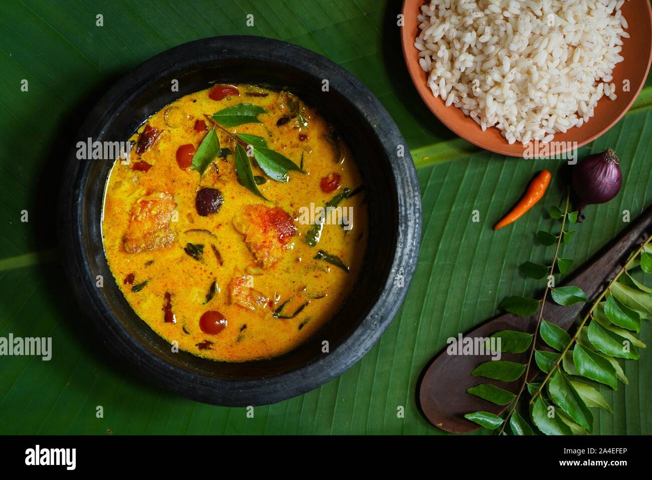 Fish Molly / Molee -Kerala style fish stew cooked in coconut milk Stock ...