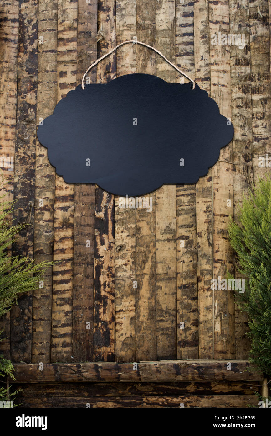 Black Empty Sign Board with string for hanging on wall Stock Photo - Alamy