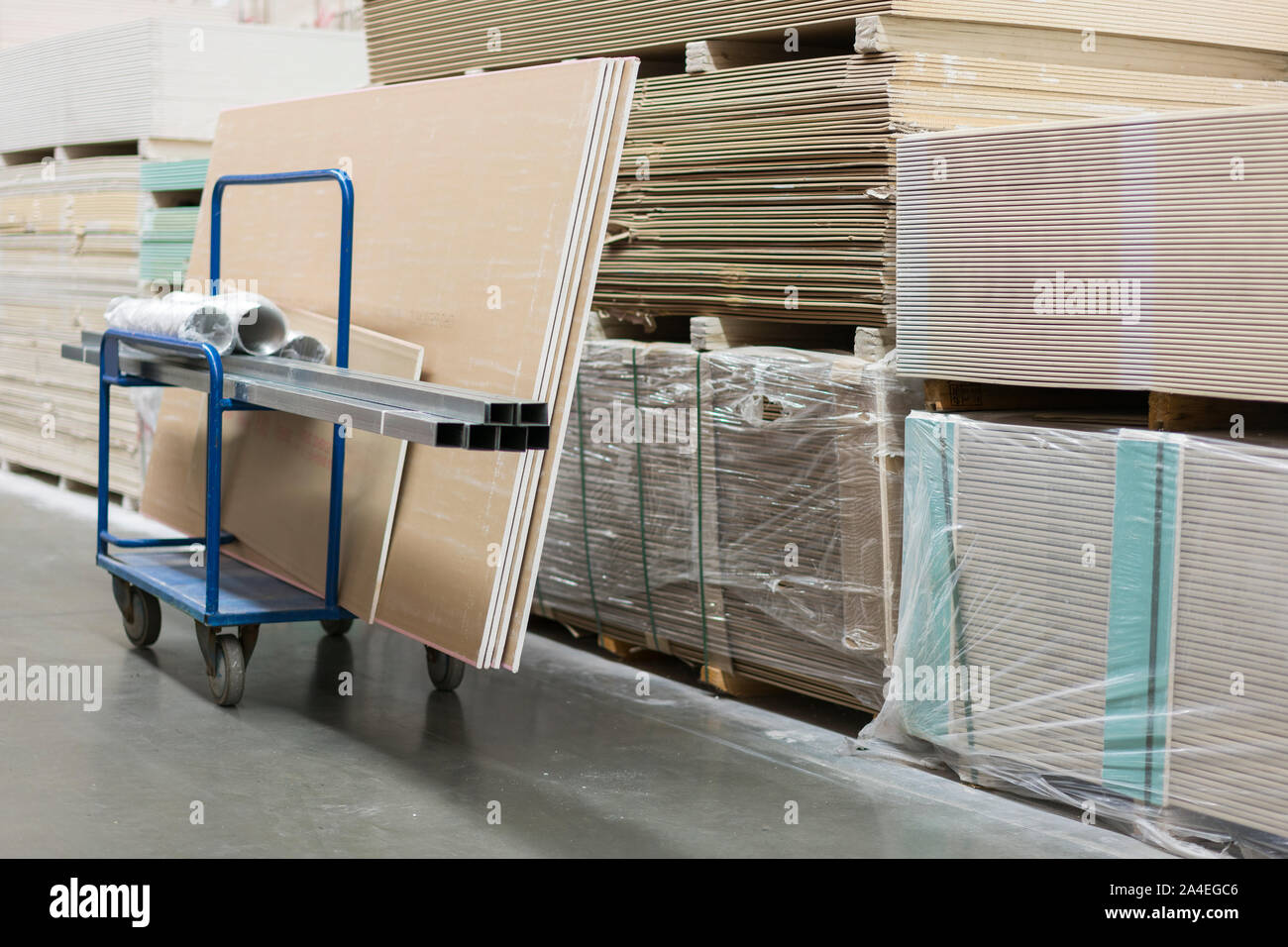 Trolley in a hardware store loaded with construction materials. Repair ...