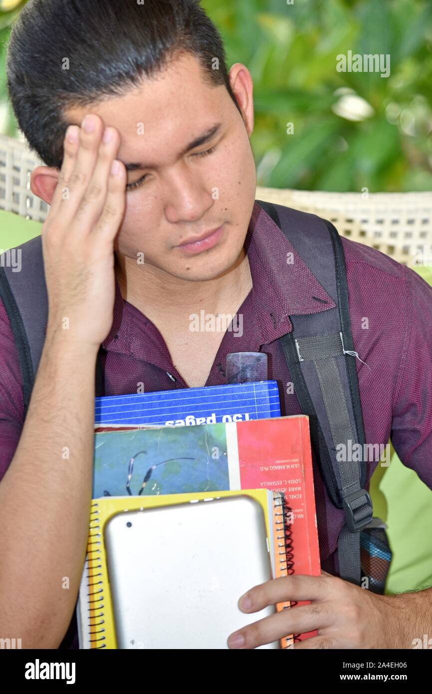 An Unhappy Male Student Stock Photo - Alamy