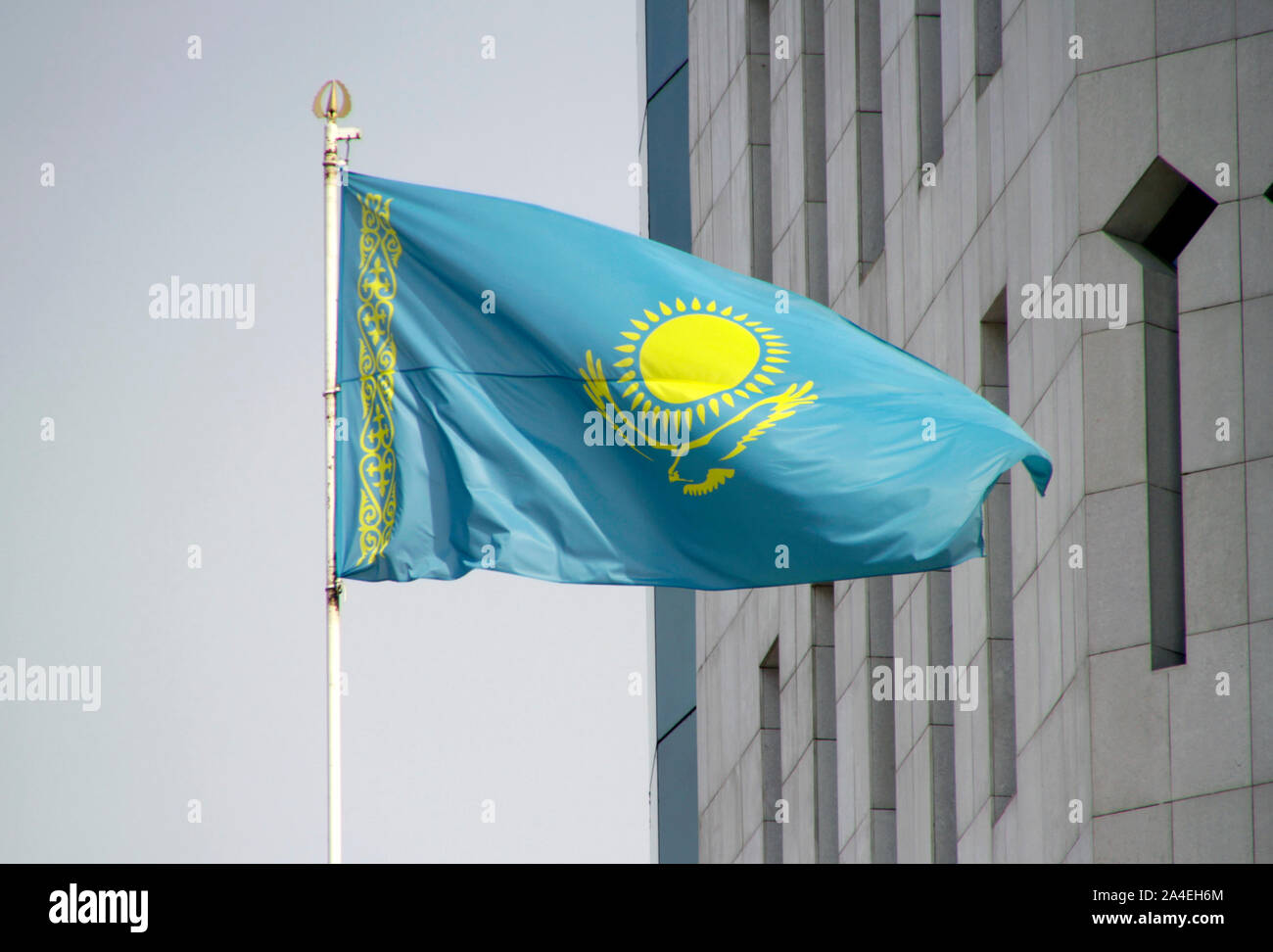 National flag of Kazakhstan in the city of Almaty on a sunny day Stock ...