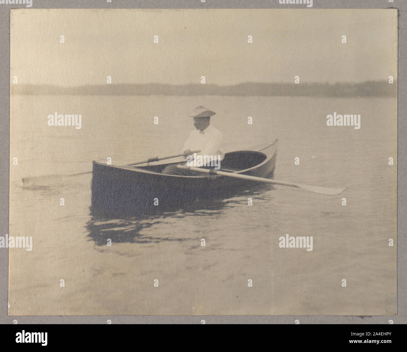 Theodore Roosevelt, seated in canoe, rowing Stock Photo - Alamy