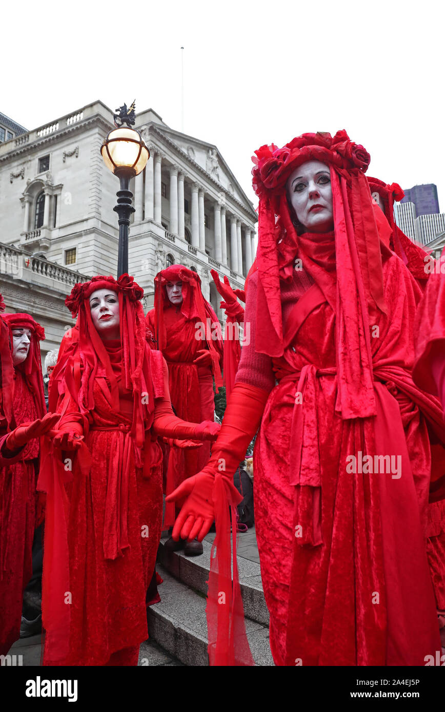The group known as the Red Rebels joins protesters blocking the road ...