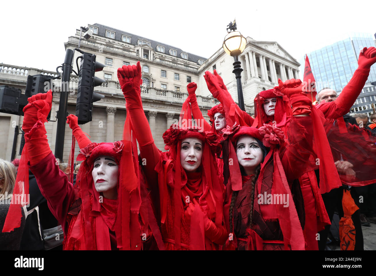 The group known as the Red Rebels joins protesters blocking the road ...