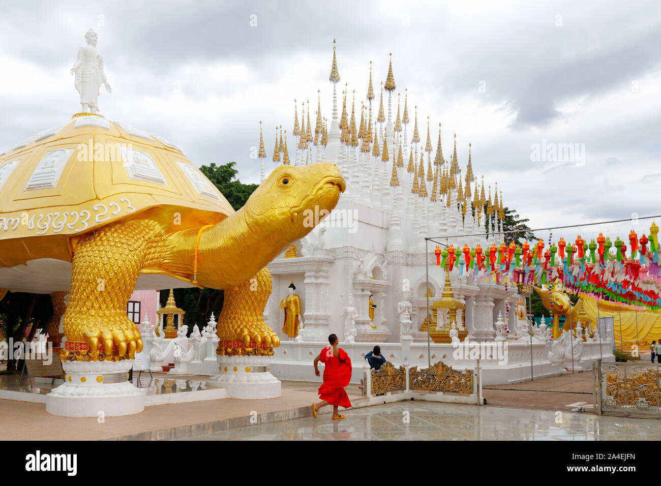The Wat Phong Sunan Buddhist temple in Thailand, with a monk running ...