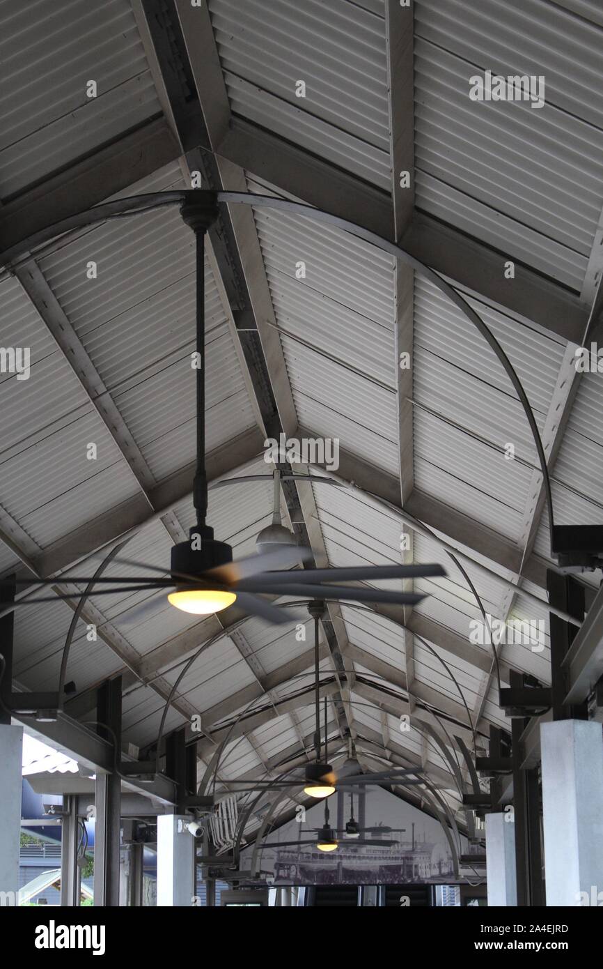 walkway with ceiling fans Stock Photo - Alamy
