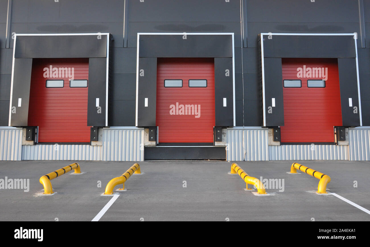 A Large distribution warehouse with gates for loading goods Stock Photo ...