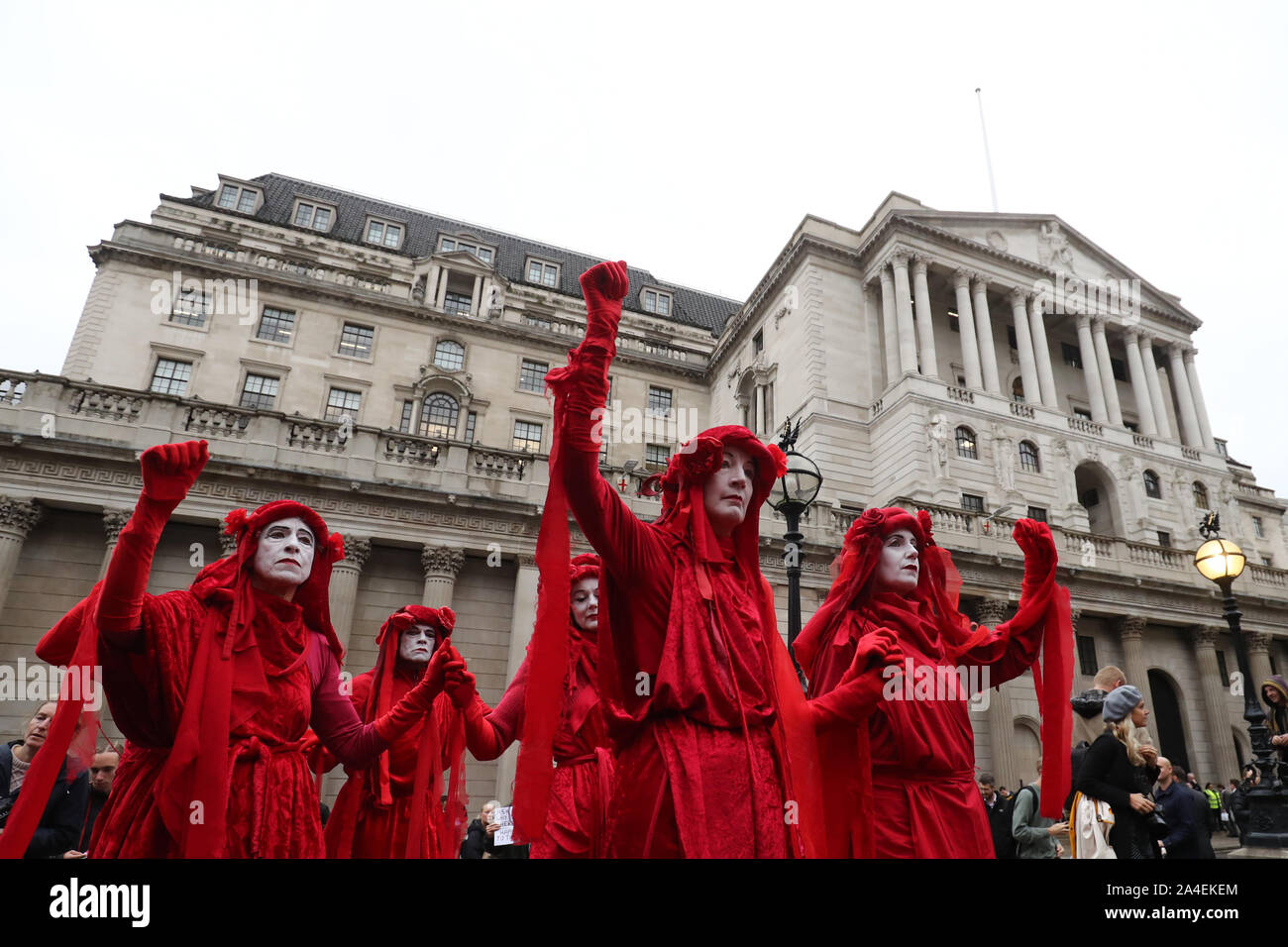 The group known as the Red Rebels joins protesters blocking the road ...
