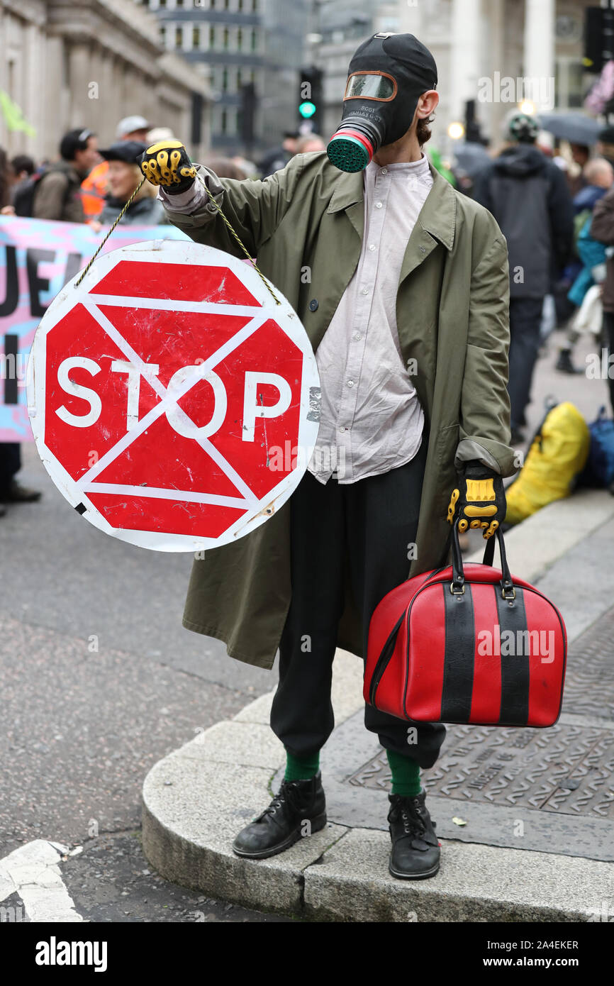 Protesters block the road outside Mansion House in the City of London ...