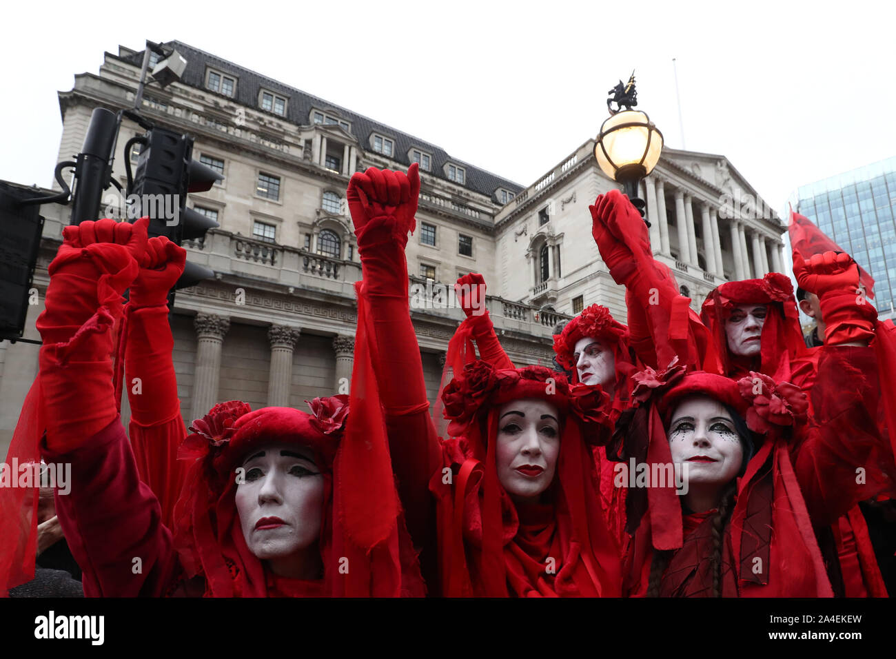 The group known as the Red Rebels joins protesters blocking the road ...