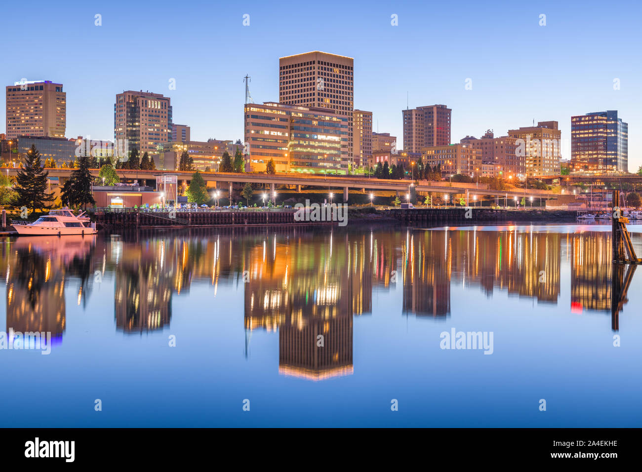 Tacoma, Washington, USA downtown skyline at dusk on Commencement Bay ...