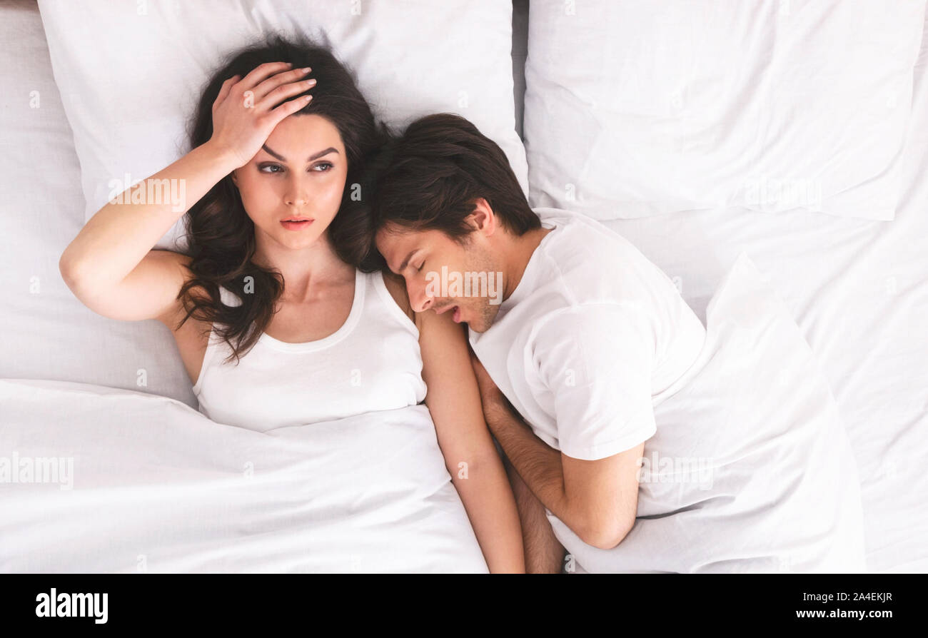 Woman sprawled in bed hi-res stock photography and images - Alamy