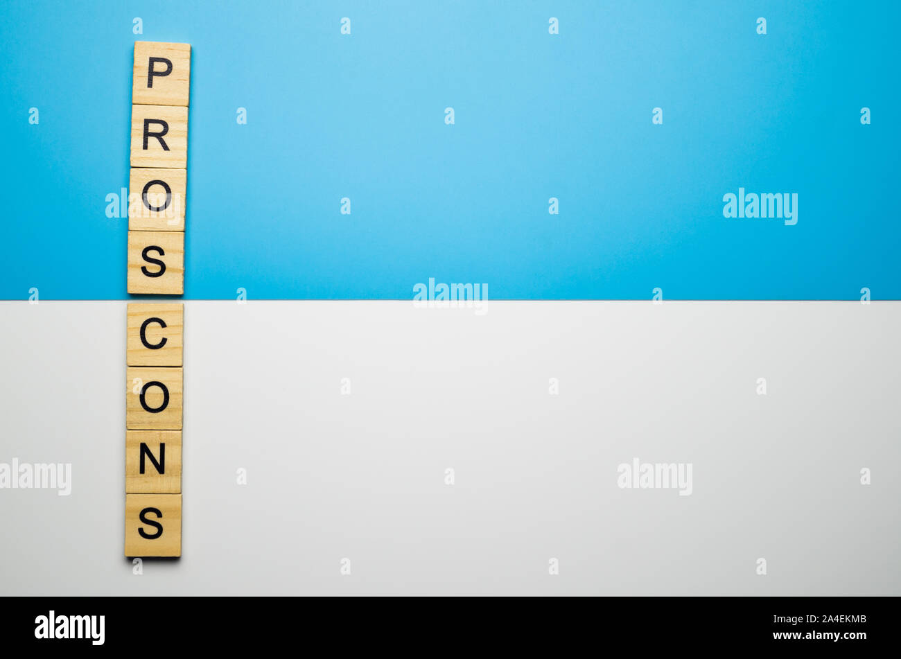 "Pros and Cons" word in the wooden block on duo color background Stock ...