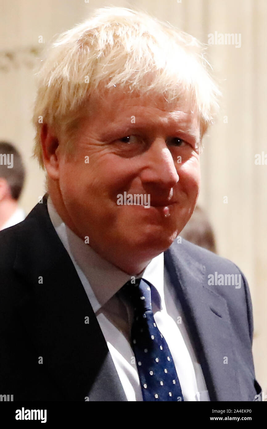 Prime Minister Boris Johnson walks back through the Peers Lobby after ...