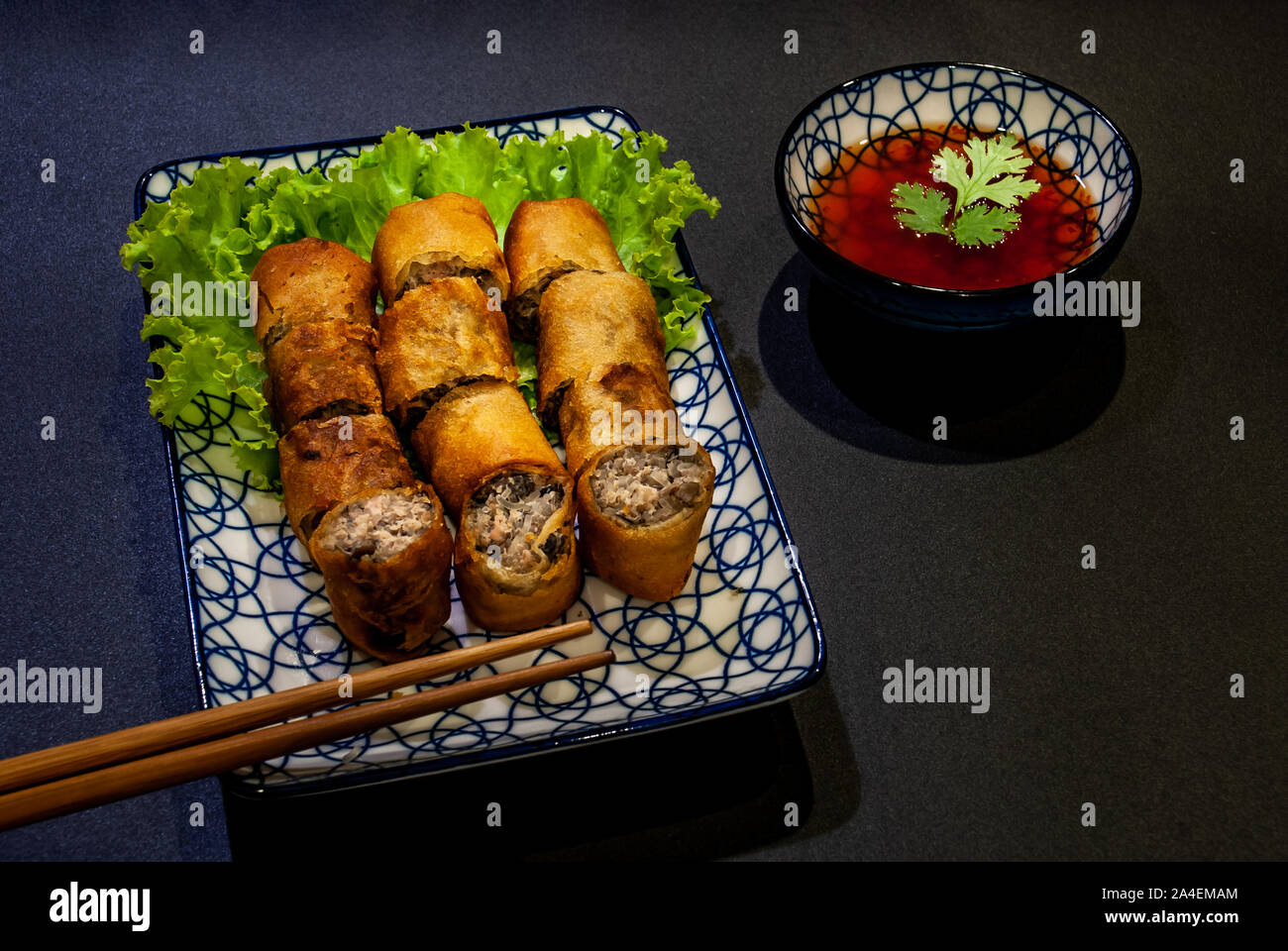 Fried traditional spring rolls food with sweet sauce in a japanese ...