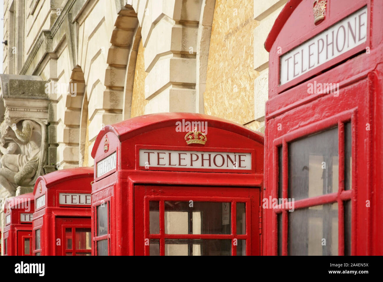 Row of old telephone boxes hi-res stock photography and images - Alamy
