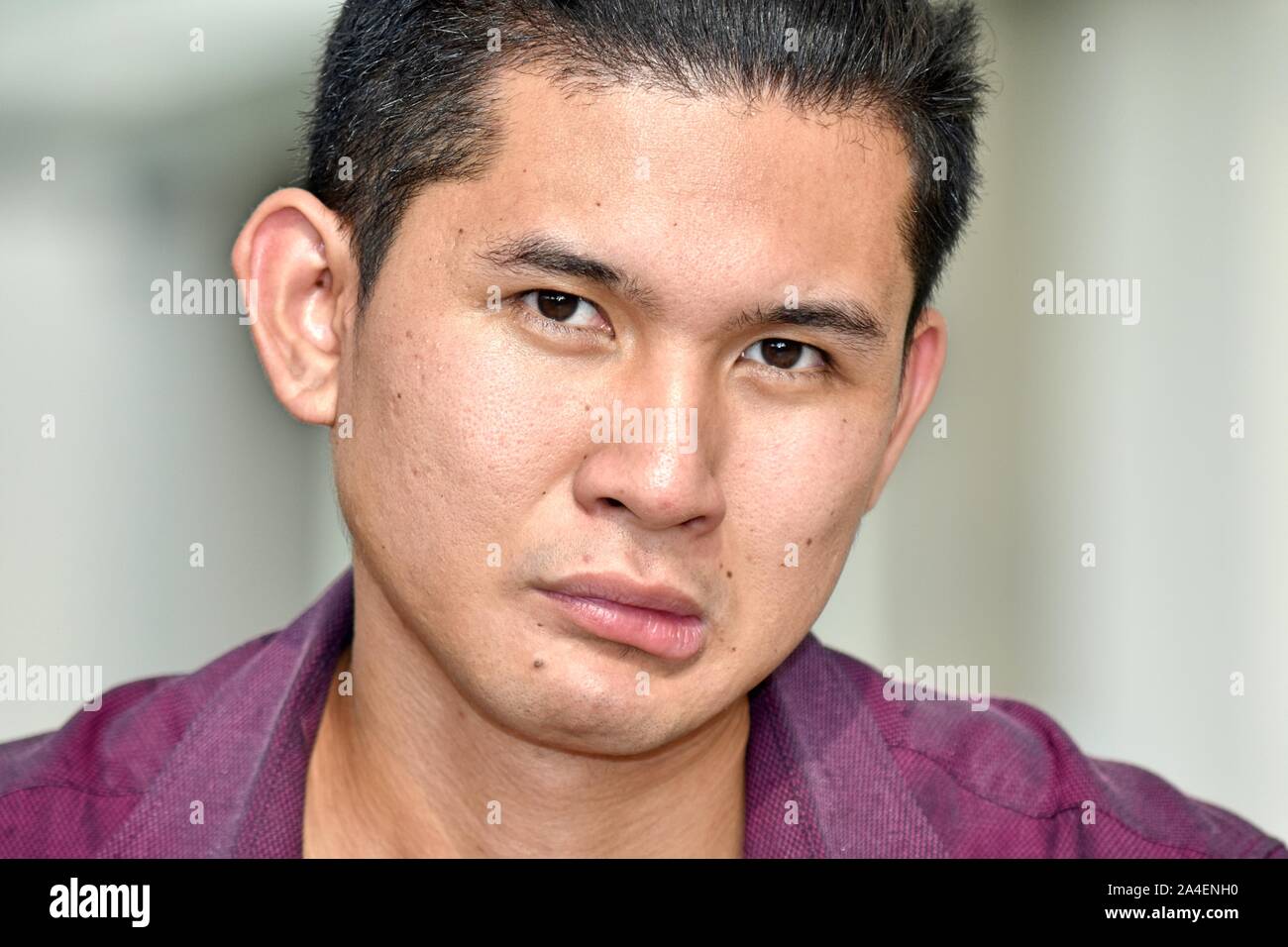 An Unhappy Filipino Person Stock Photo - Alamy