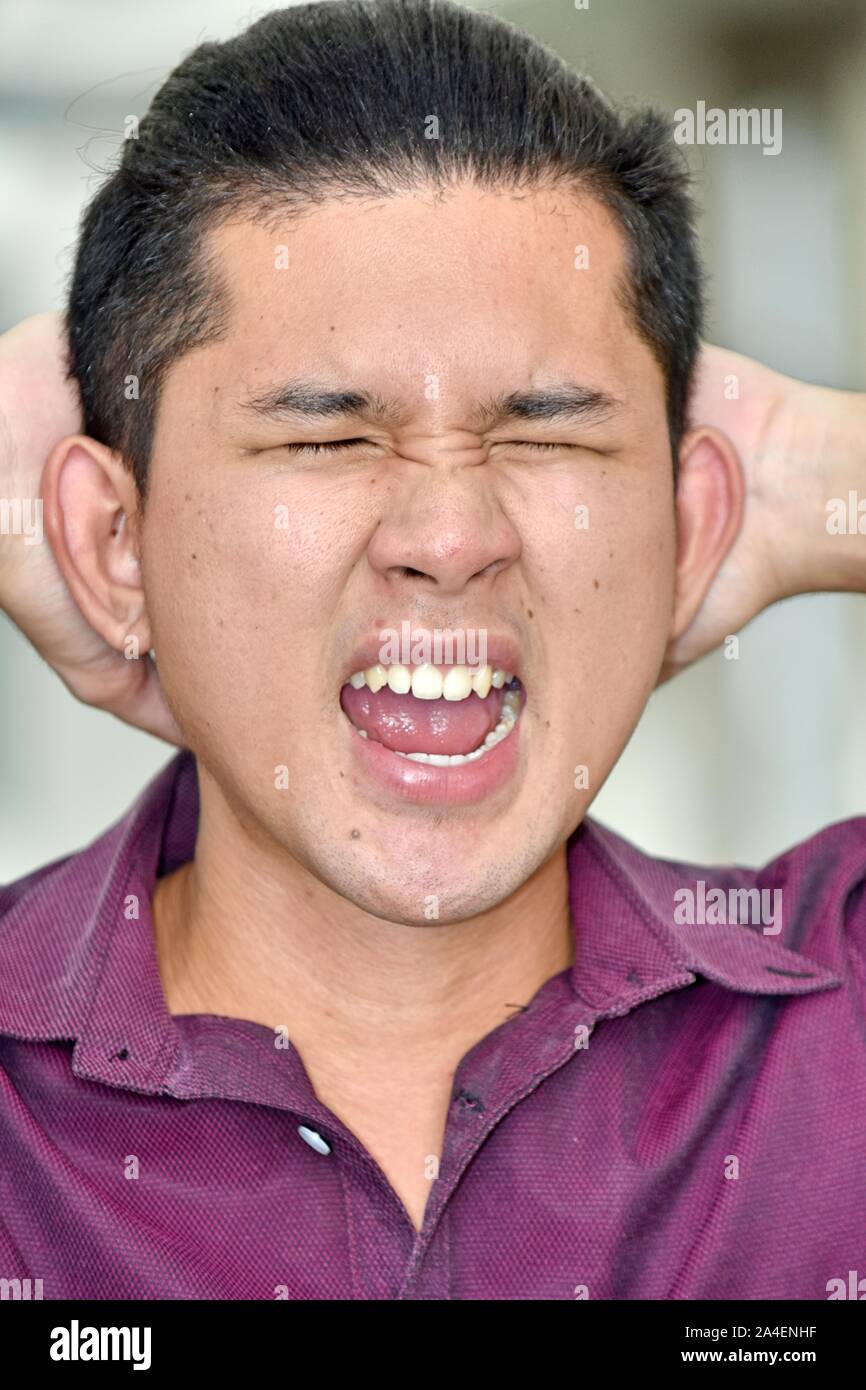 Handsome Filipino Male Yelling Stock Photo - Alamy