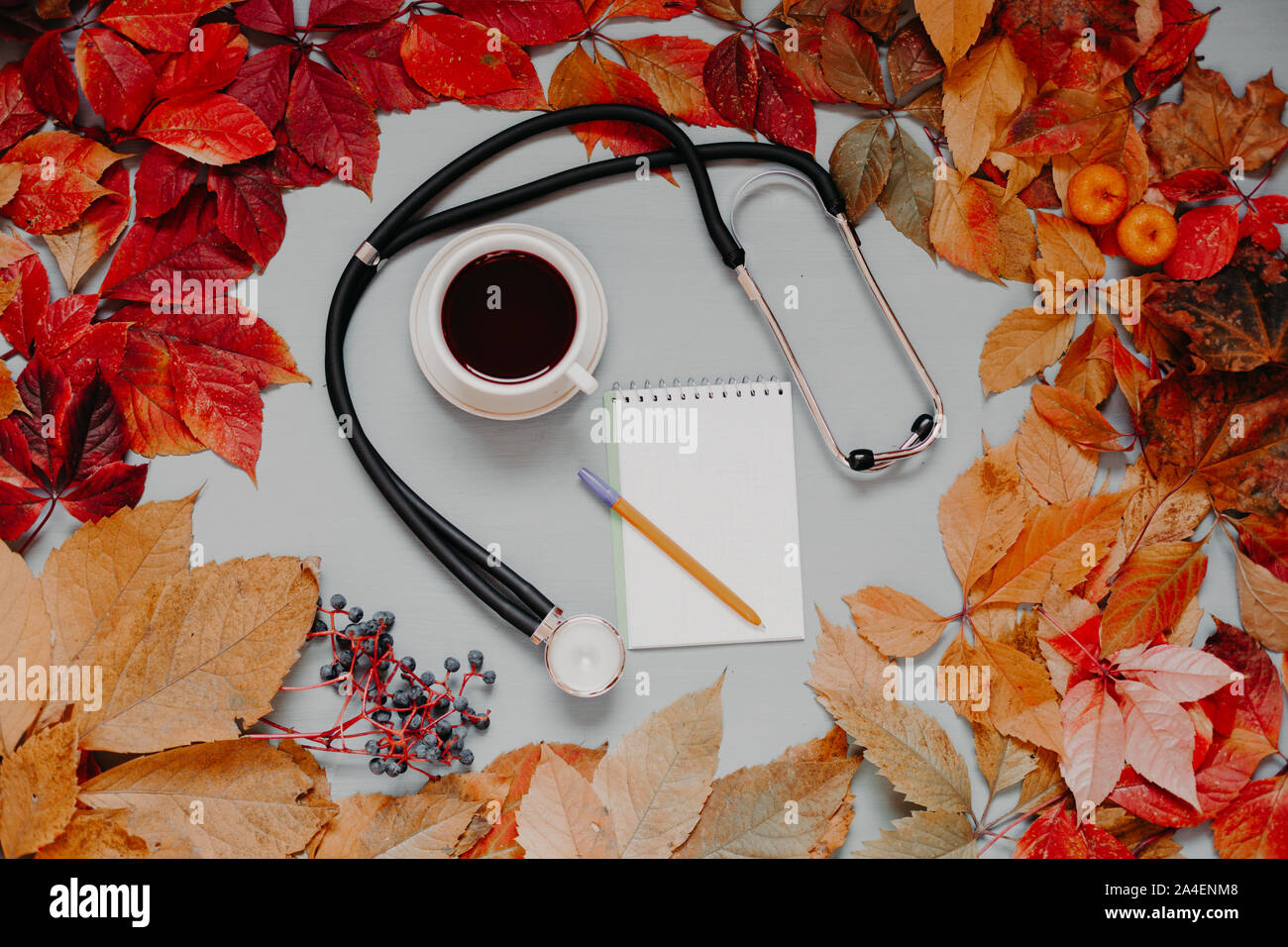 autumn background with medical equipment and red yellow leaves Stock ...