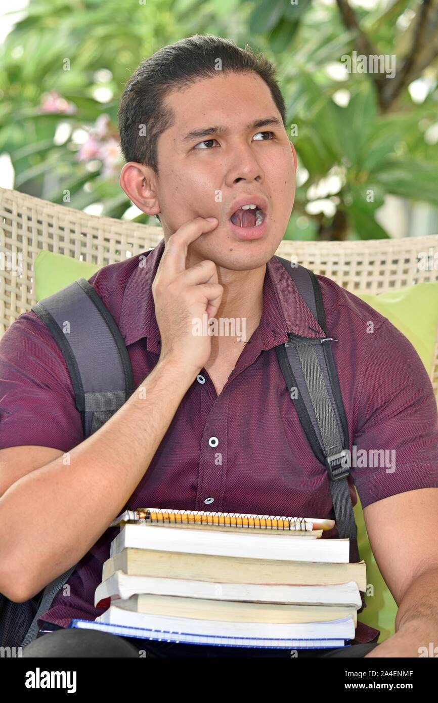Boy Student With Toothache With Books Stock Photo - Alamy