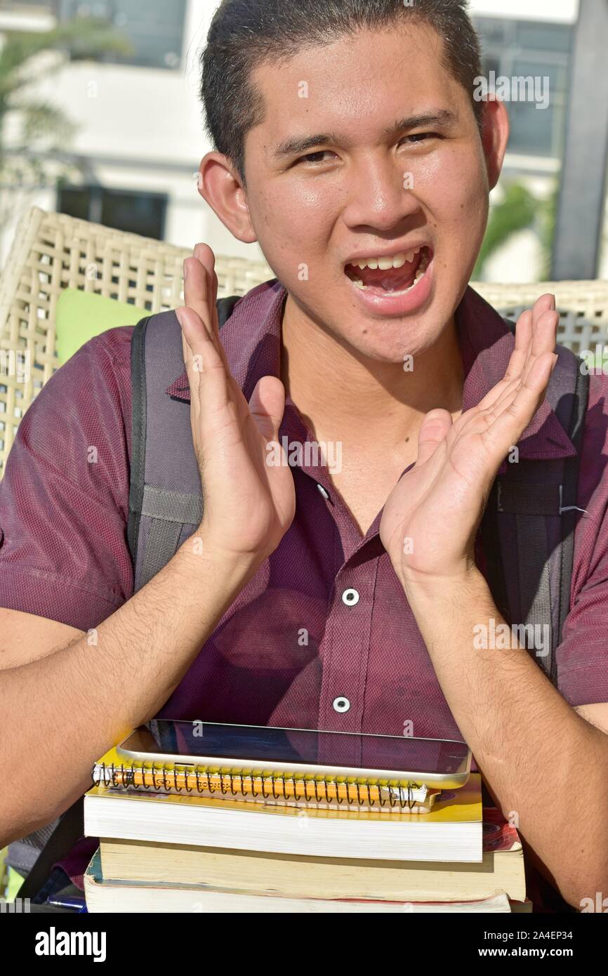Surprised University Person With Books Stock Photo - Alamy