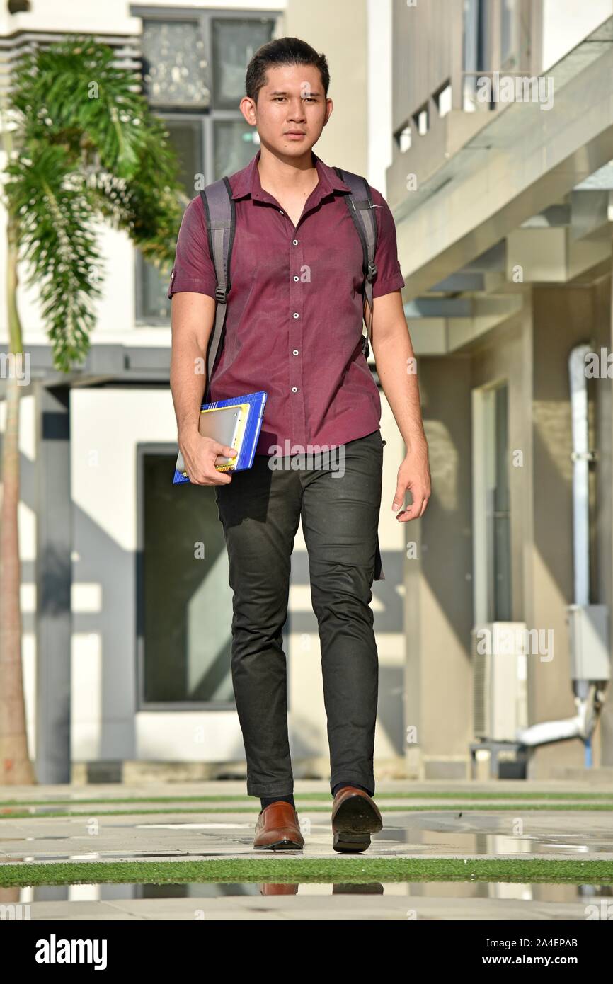 Handsome Boy Student Walking On Campus Stock Photo - Alamy