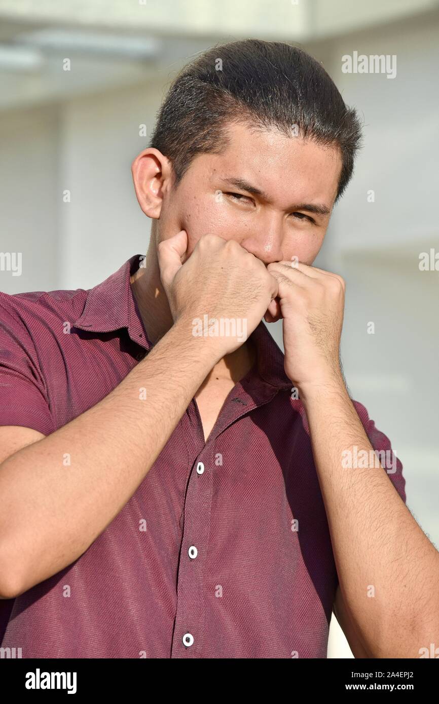 An Asian Man Afraid Stock Photo - Alamy