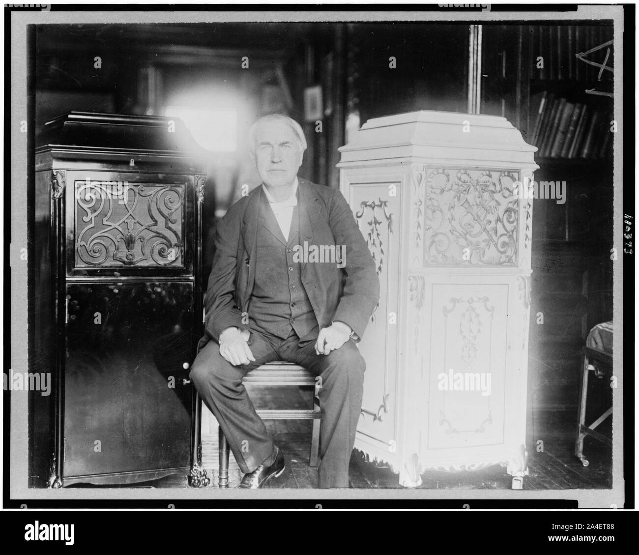 Thomas Alva Edison, full-length portrait, seated, facing front, between ...