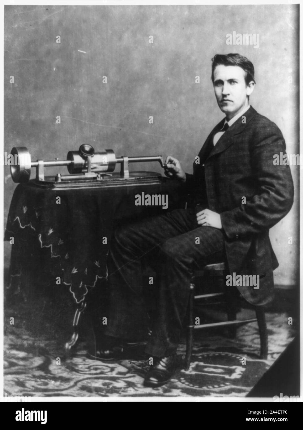 Thomas Edison, full-length portrait, seated, facing front, with ...