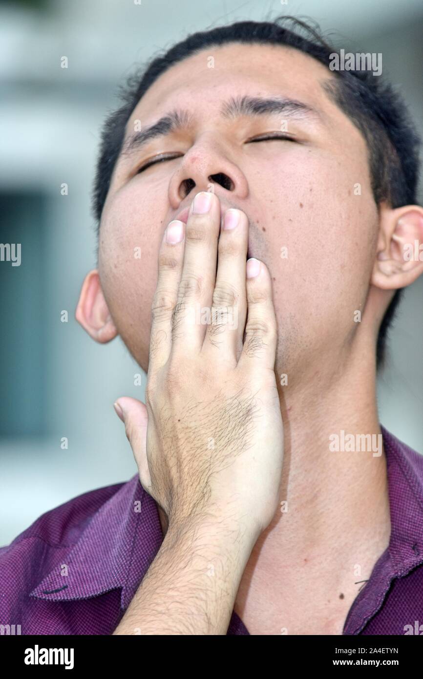 Sleepy Young Filipino Person Stock Photo - Alamy