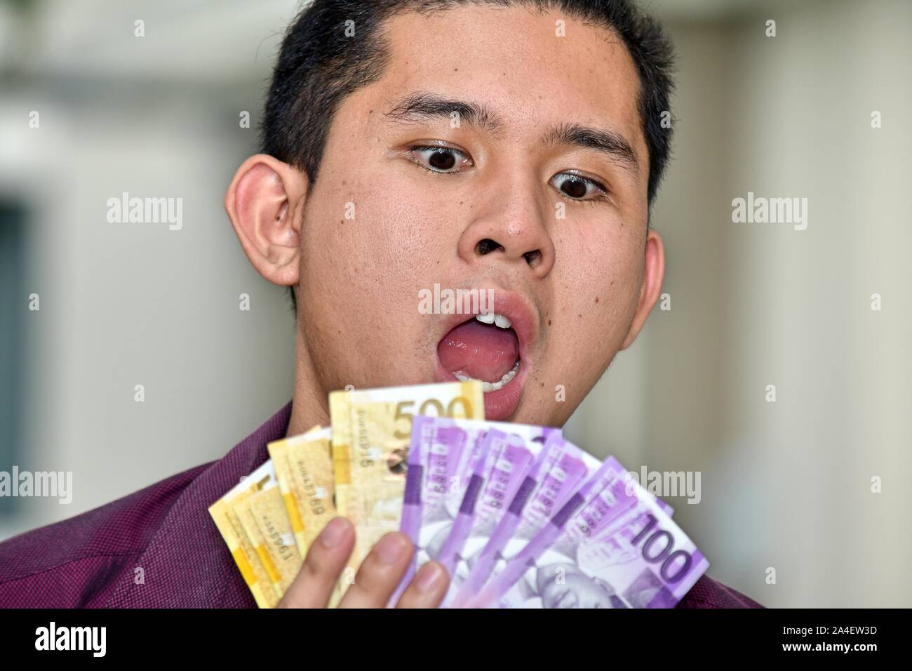 Male Counting Money Stock Photo - Alamy