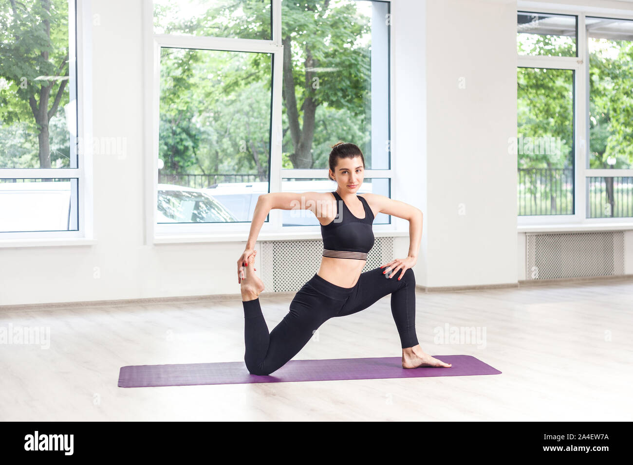 Black anjaneyasana hands hi-res stock photography and images - Alamy