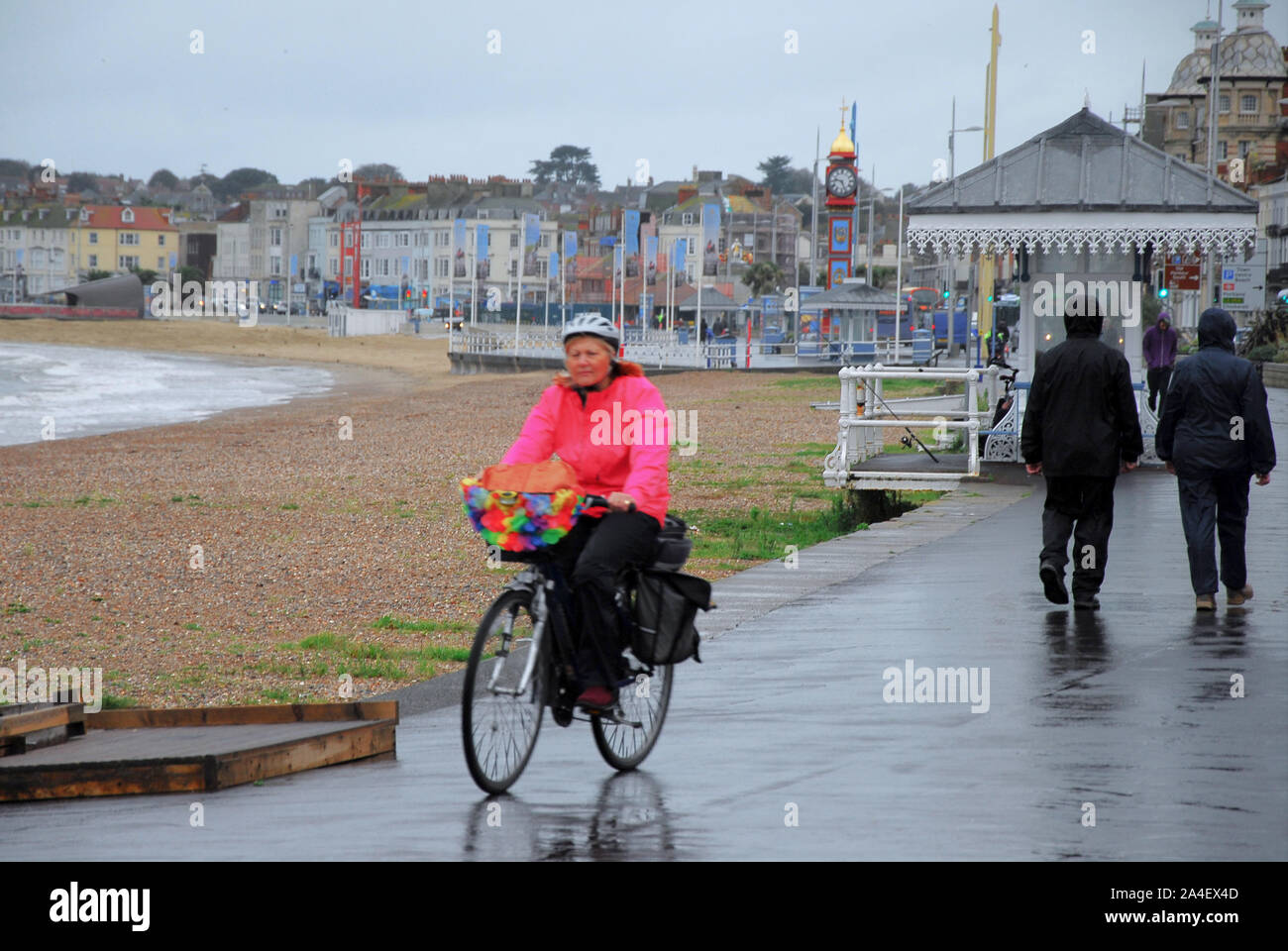 Wet cyclist waves hi-res stock photography and images - Alamy