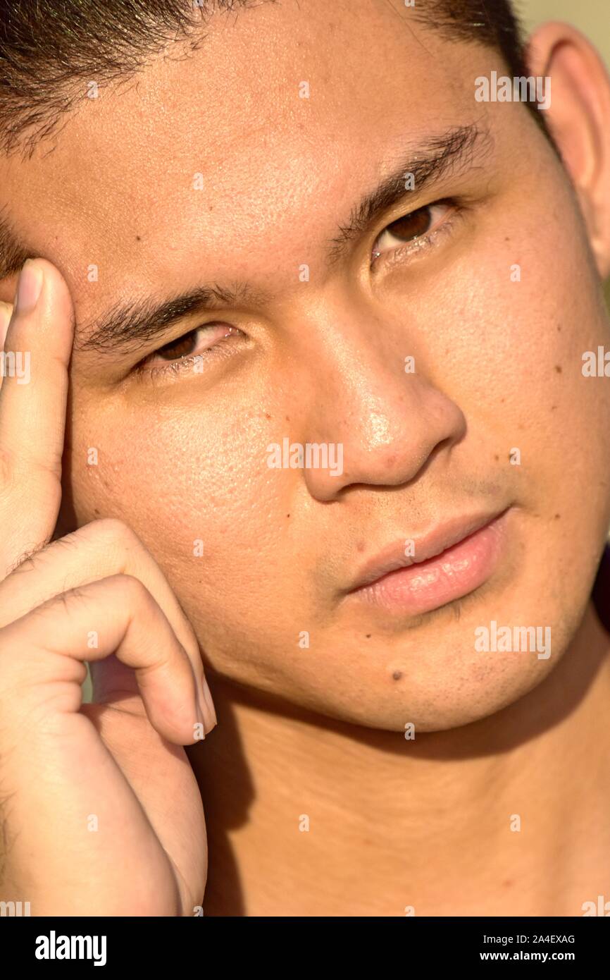 Filipino Male Thinking Stock Photo - Alamy