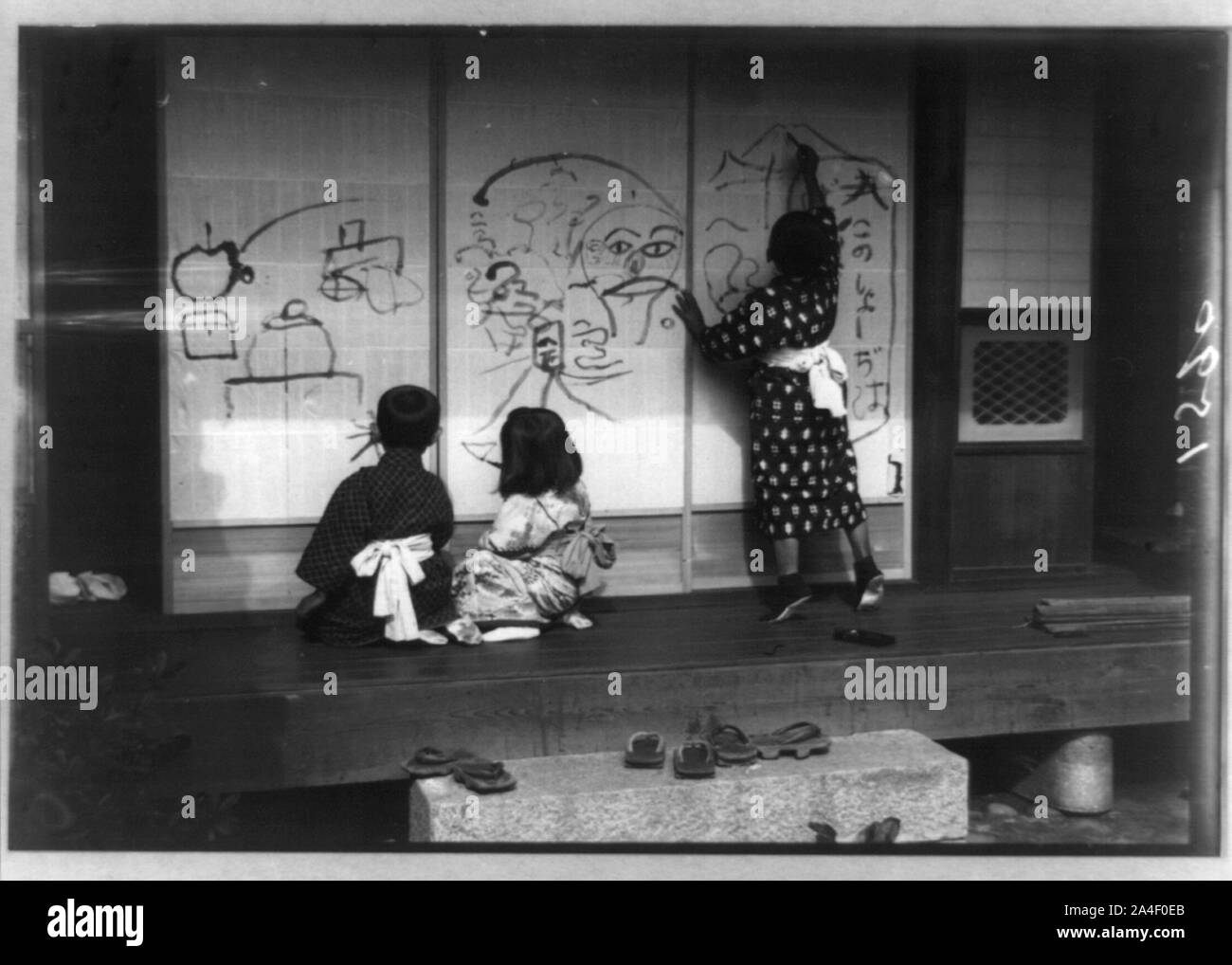 Three children drawing, [on panels], Japan, 1909 Stock Photo - Alamy