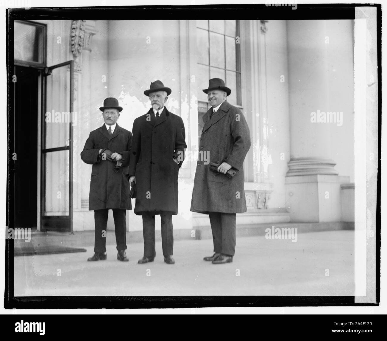 Three men building Black and White Stock Photos & Images - Alamy