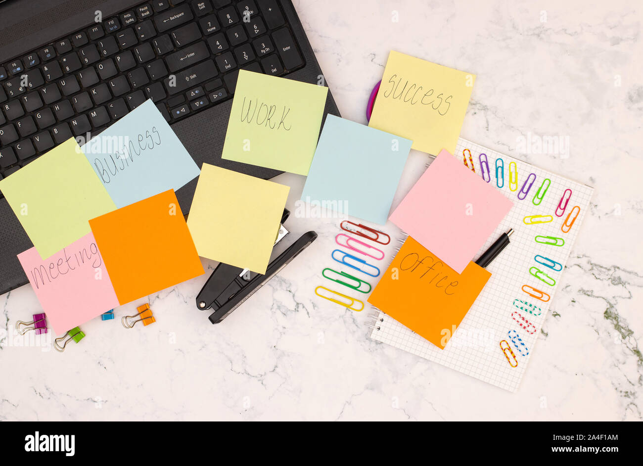 Top view of office table. Office table full with office supplies and ...