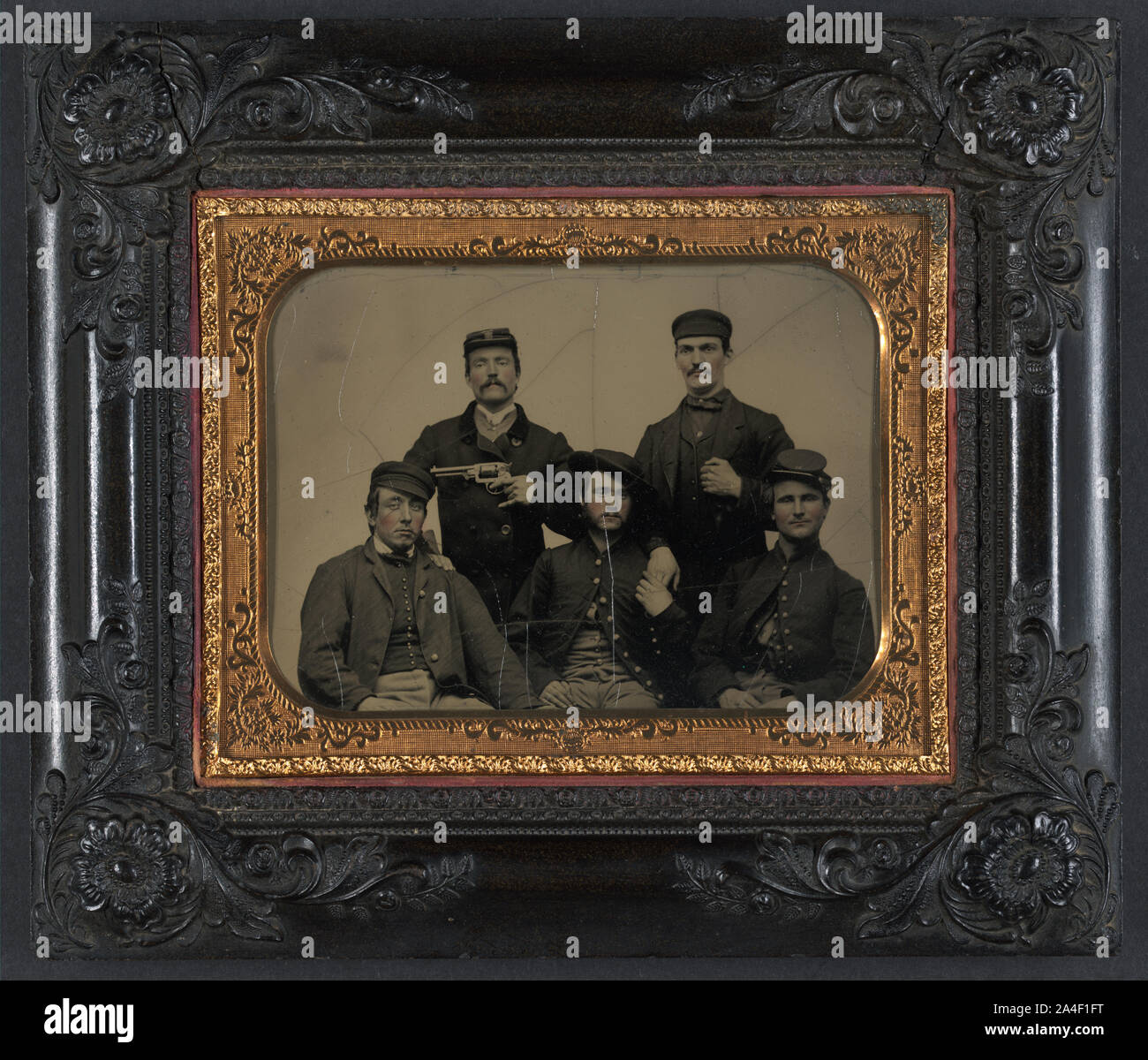 Three unidentified men in Union uniforms and two unidentified men, one ...