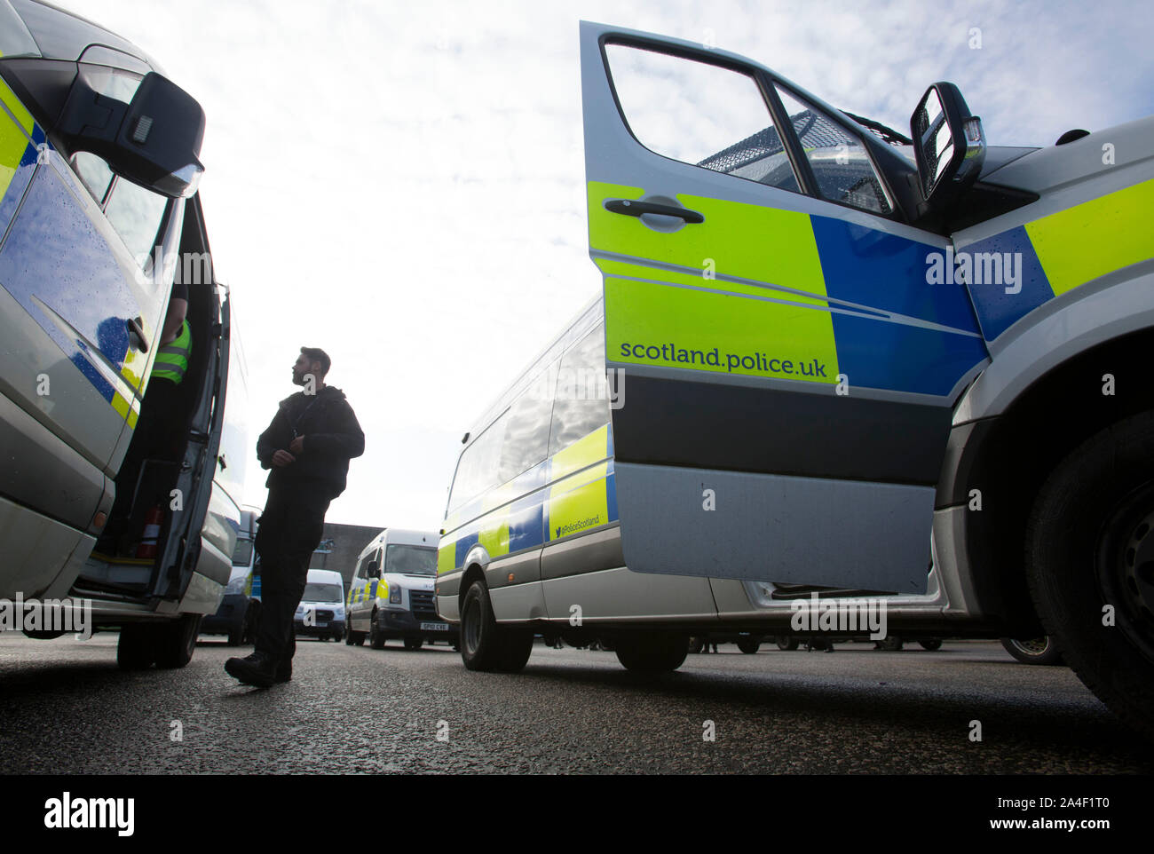 Vans leave from the Scottish Police College at Tulliallan Castle ...