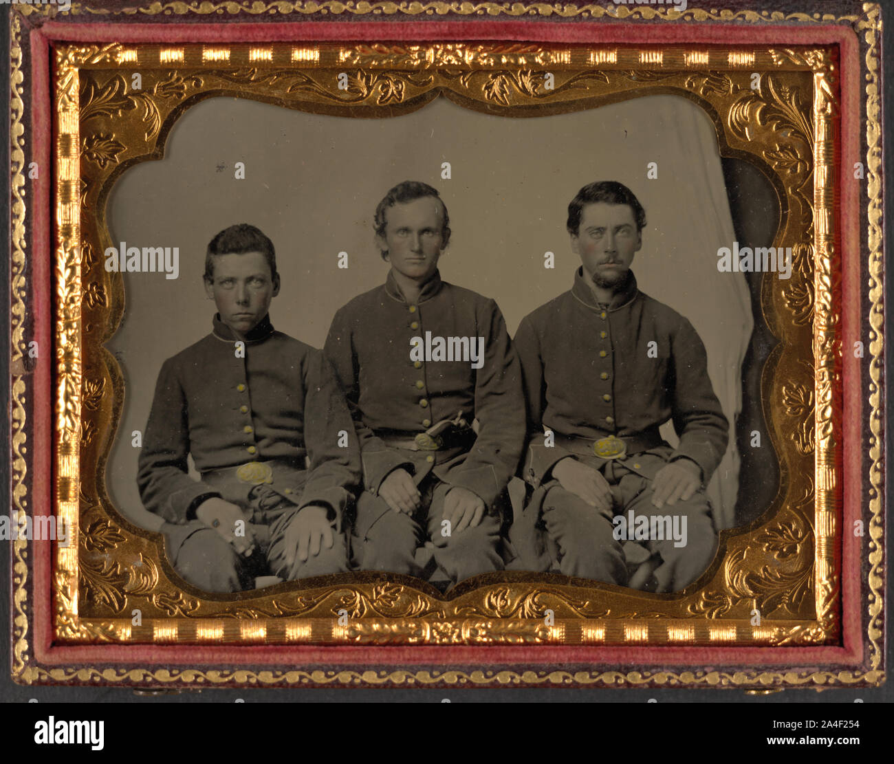 Three unidentified young soldiers in Union uniforms, one with pistol ...